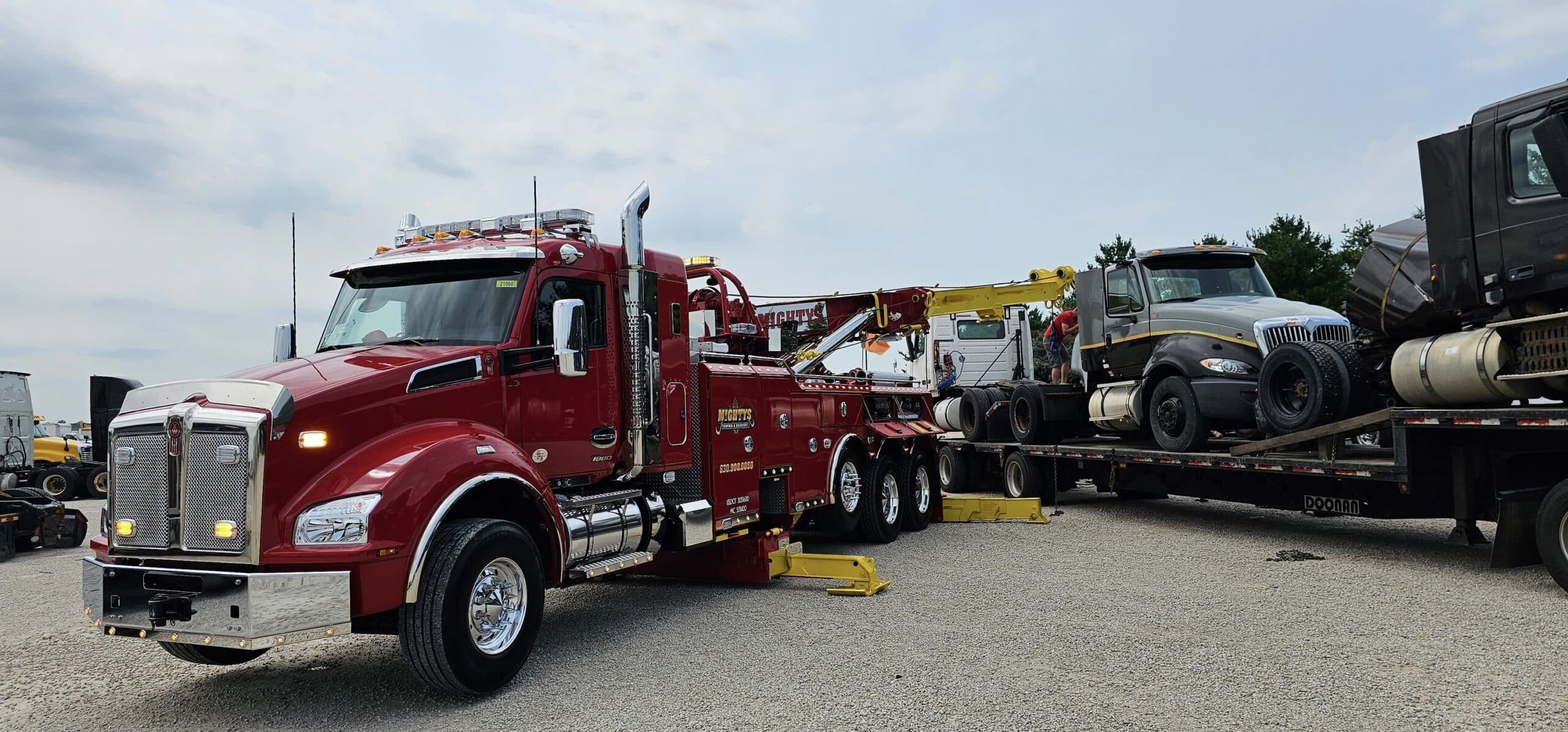 Gallery of Prisitine Tow Trucks. Mighty's Towing & Recovery Inc.